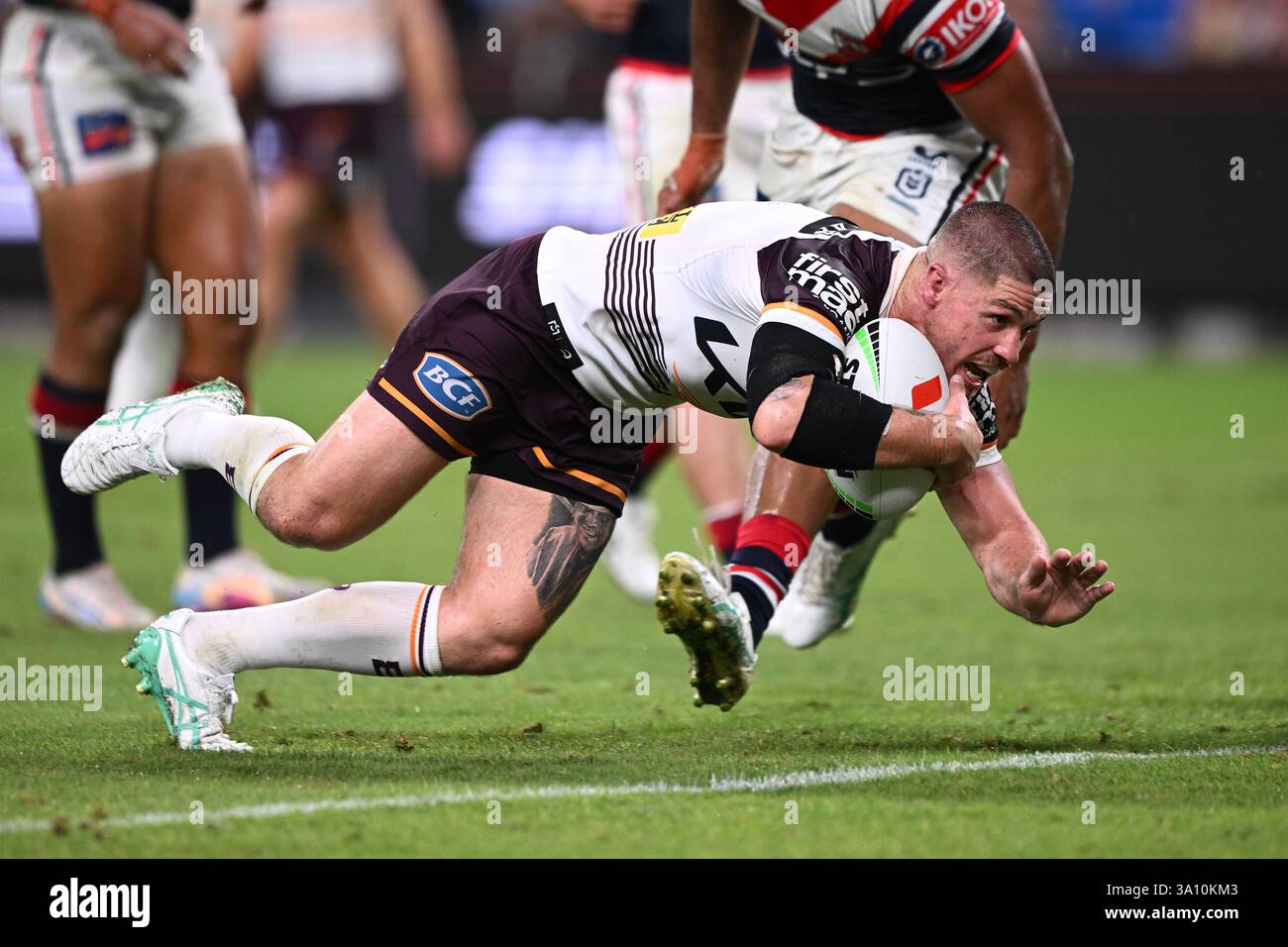 Cory Paix of the Broncos scores a try during the NRL Round 1 match ...