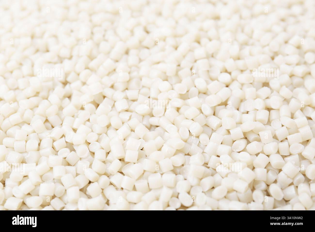 Pile of plastic granules as background, closeup Stock Photo - Alamy
