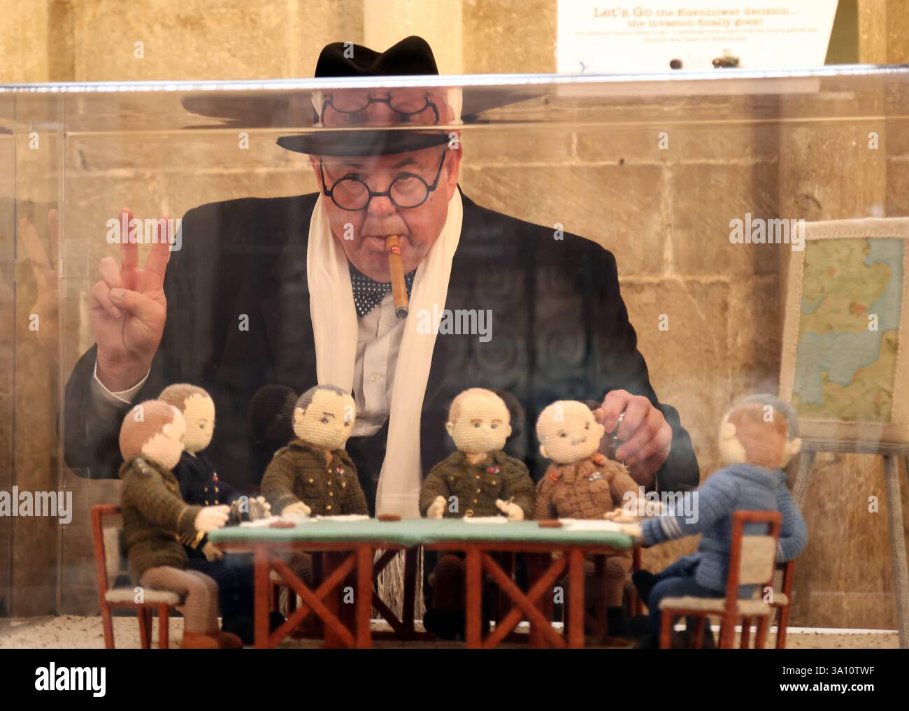 Sir Winston Churchill (re-enacted by Stephen Howlett), looks at one of ...