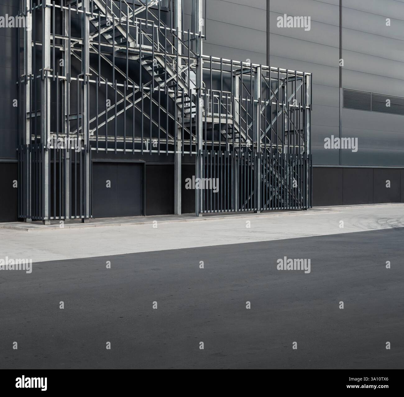 Industrial building exterior - emergency exit: metal staircase attached ...