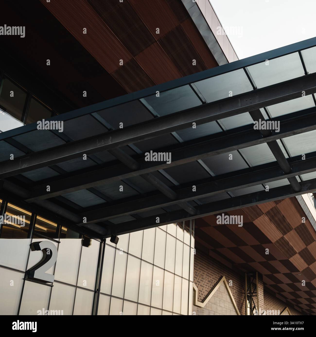 Modern office building exterior. Entrance number two - facade with ...