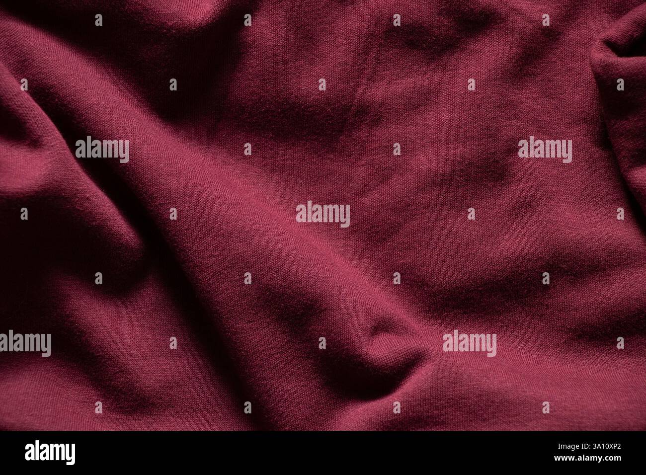 Red synthetic fabric with folds as background, red soft warm fabric ...