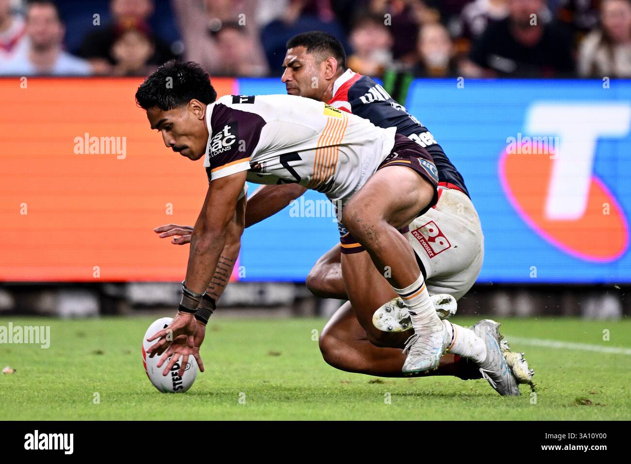 Deine Mariner of the Broncos scores a try during the NRL Round 1 match ...
