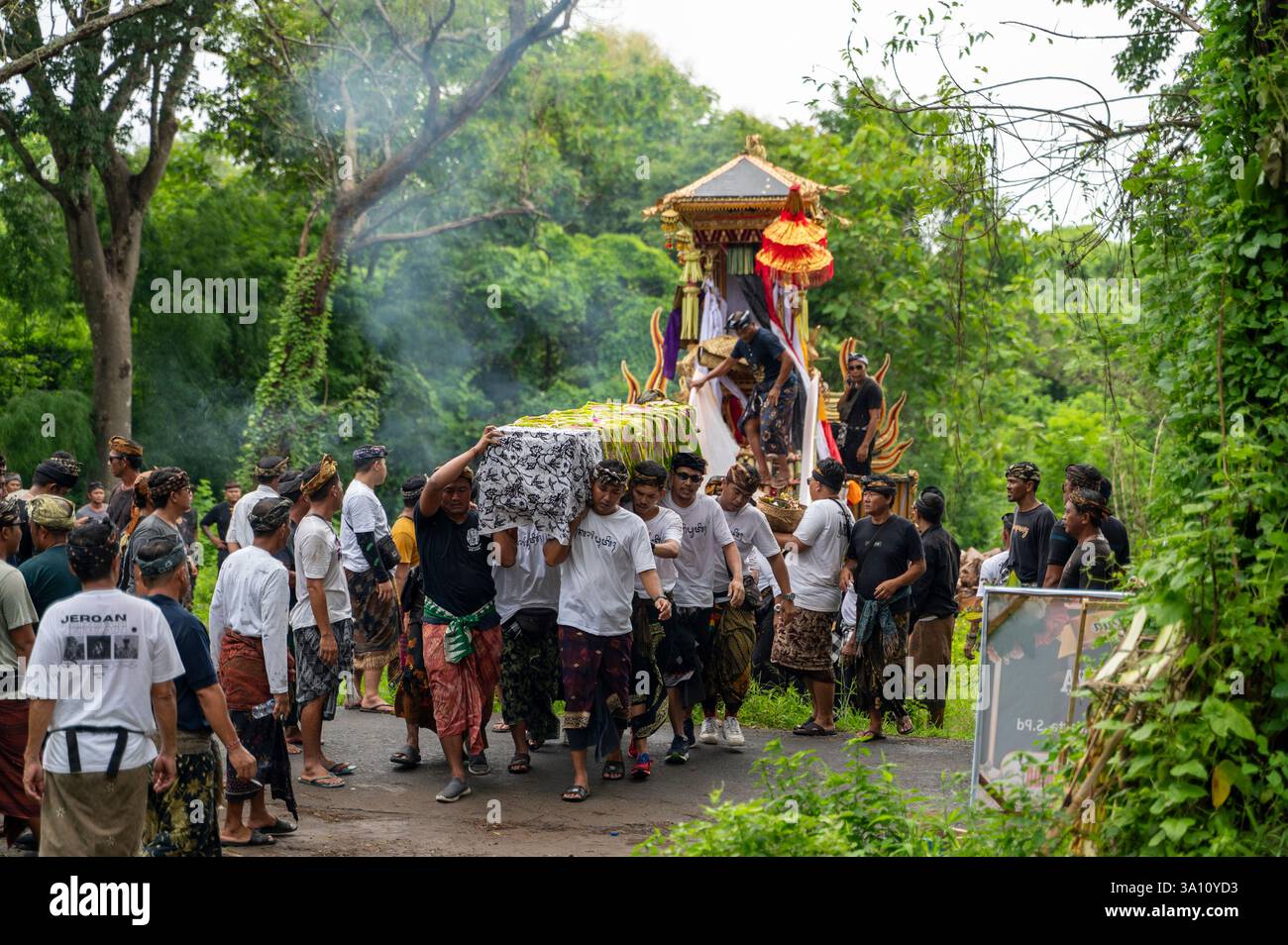 Group of men carrying funeral shrine in procession in forest Stock ...
