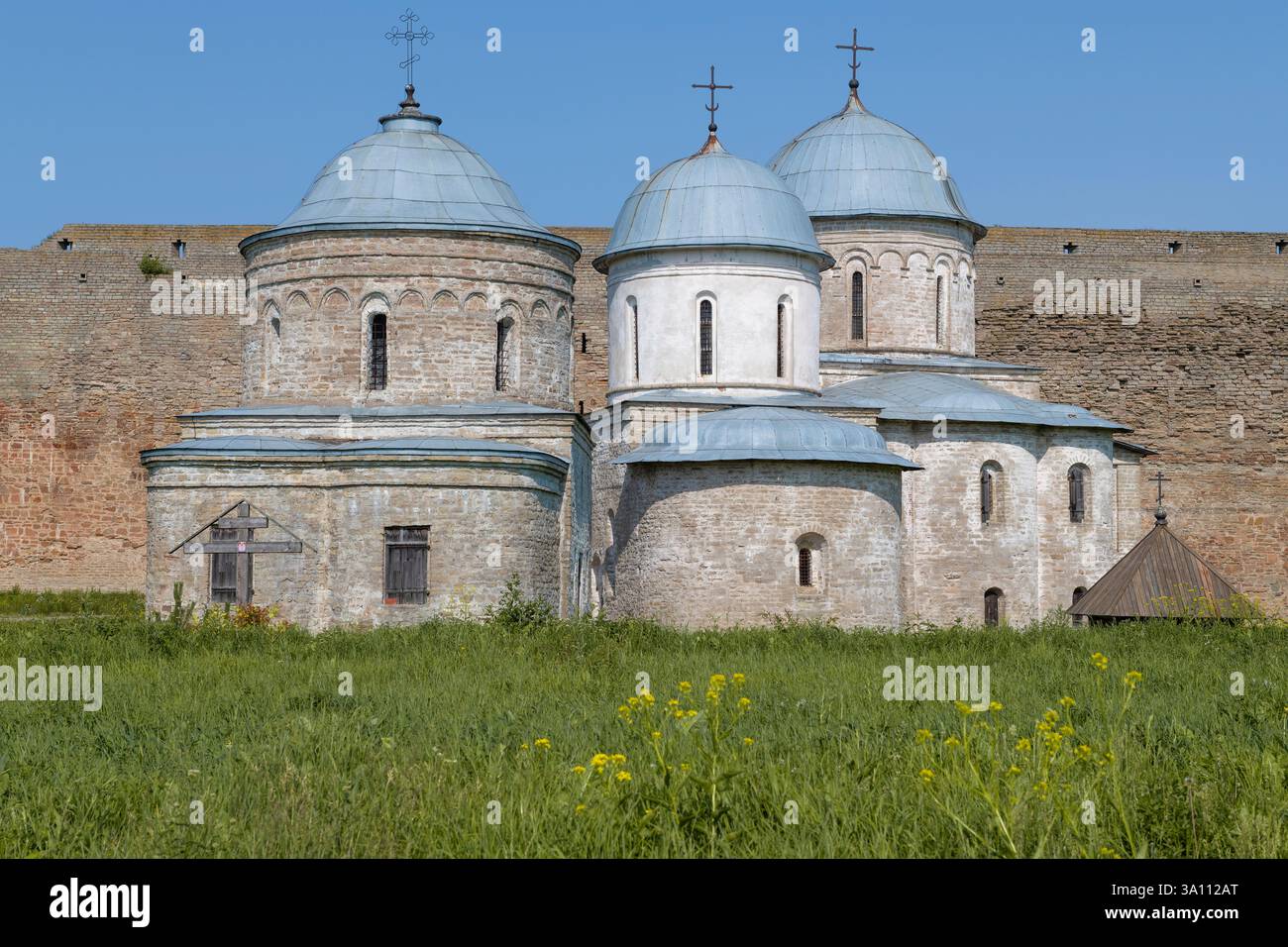 Ancient temples of the Ivangorod fortress on a sunny July day ...