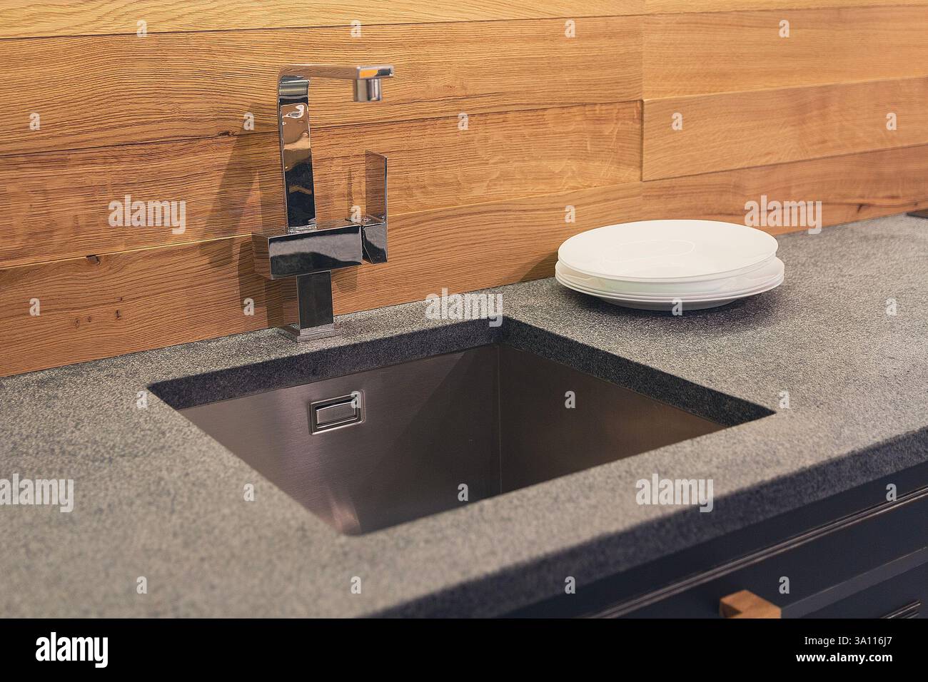 Kitchen sink with granite work surface Stock Photo - Alamy