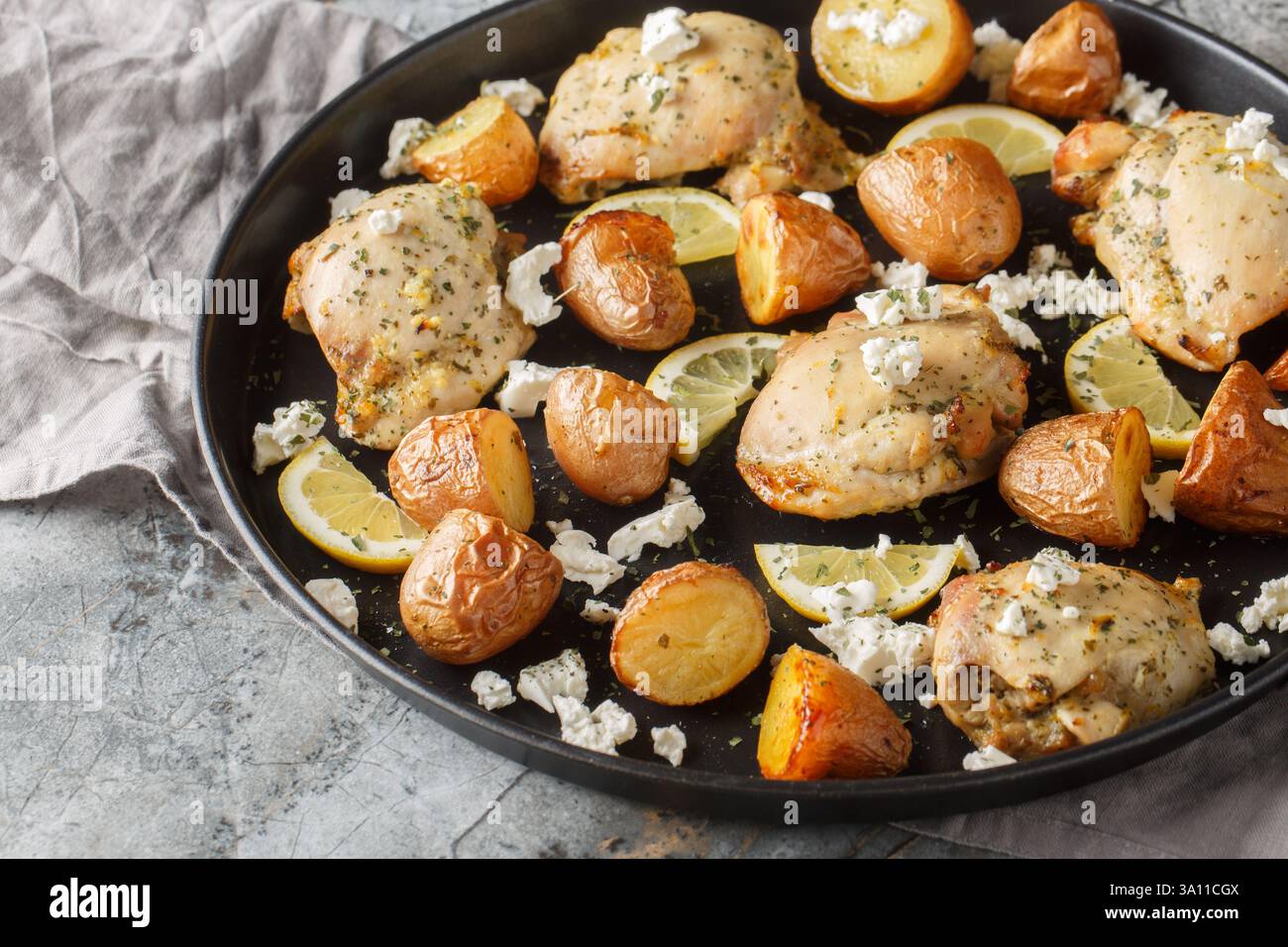 Greek cuisine Skinless chicken thighs with feta, lemon, garlic and ...