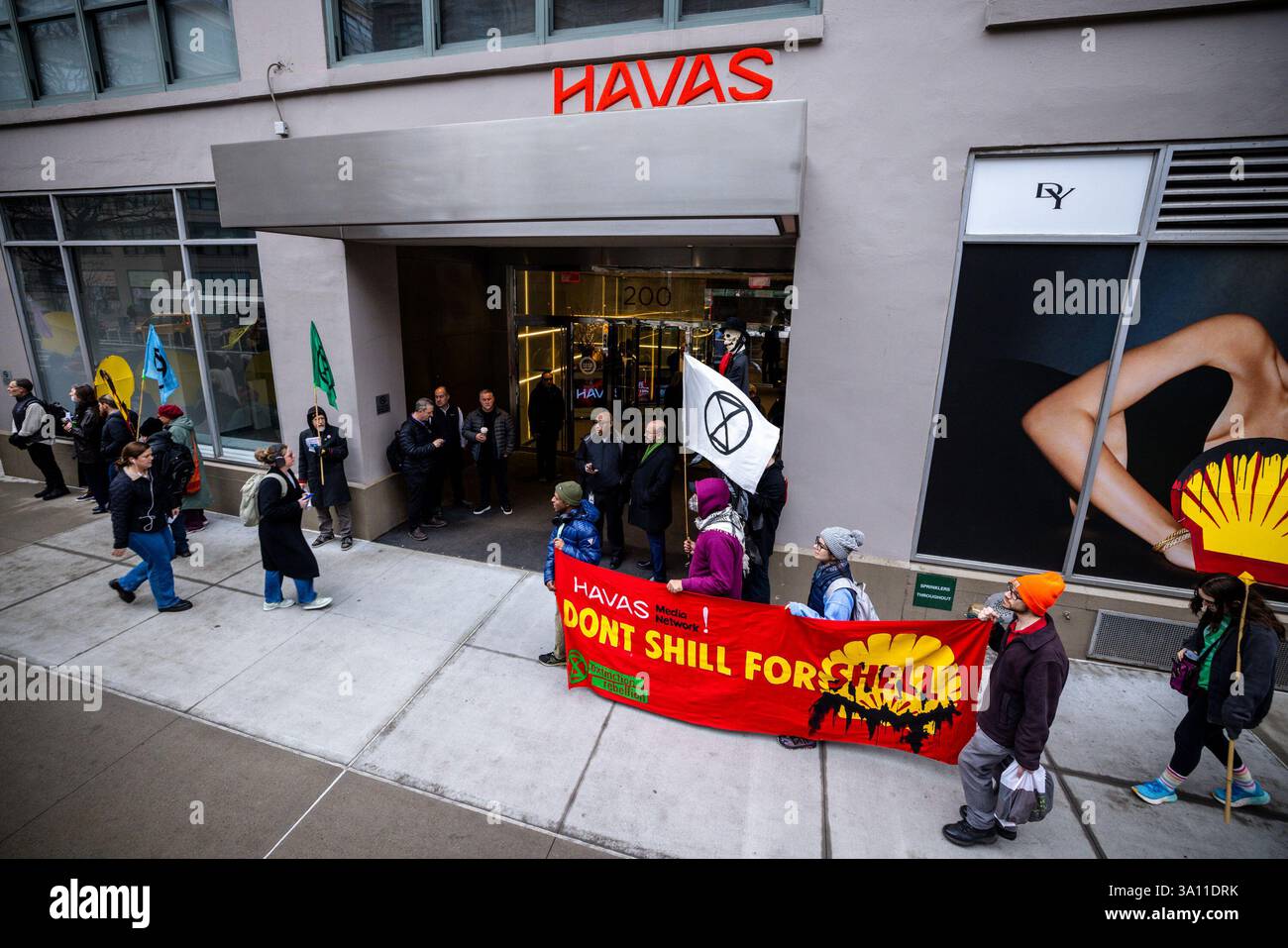 Members of the climate activist group Extinction Rebellion protest ...
