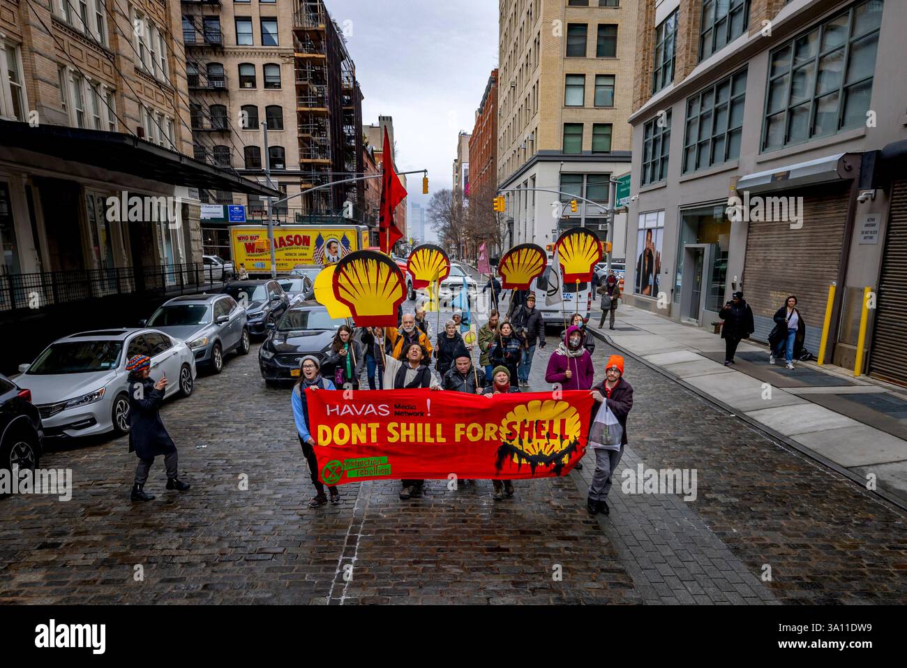 Members of the climate activist group Extinction Rebellion protest ...