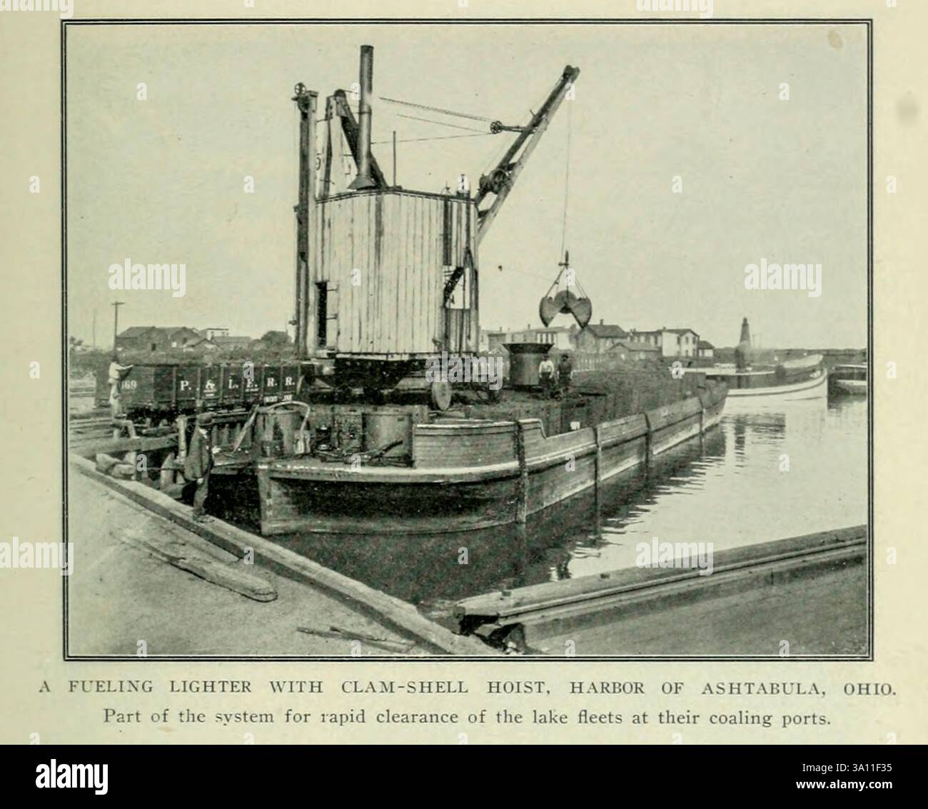 A fueling lighter with clam shell hoist. Harbor of Ashtabula, OHIO ...