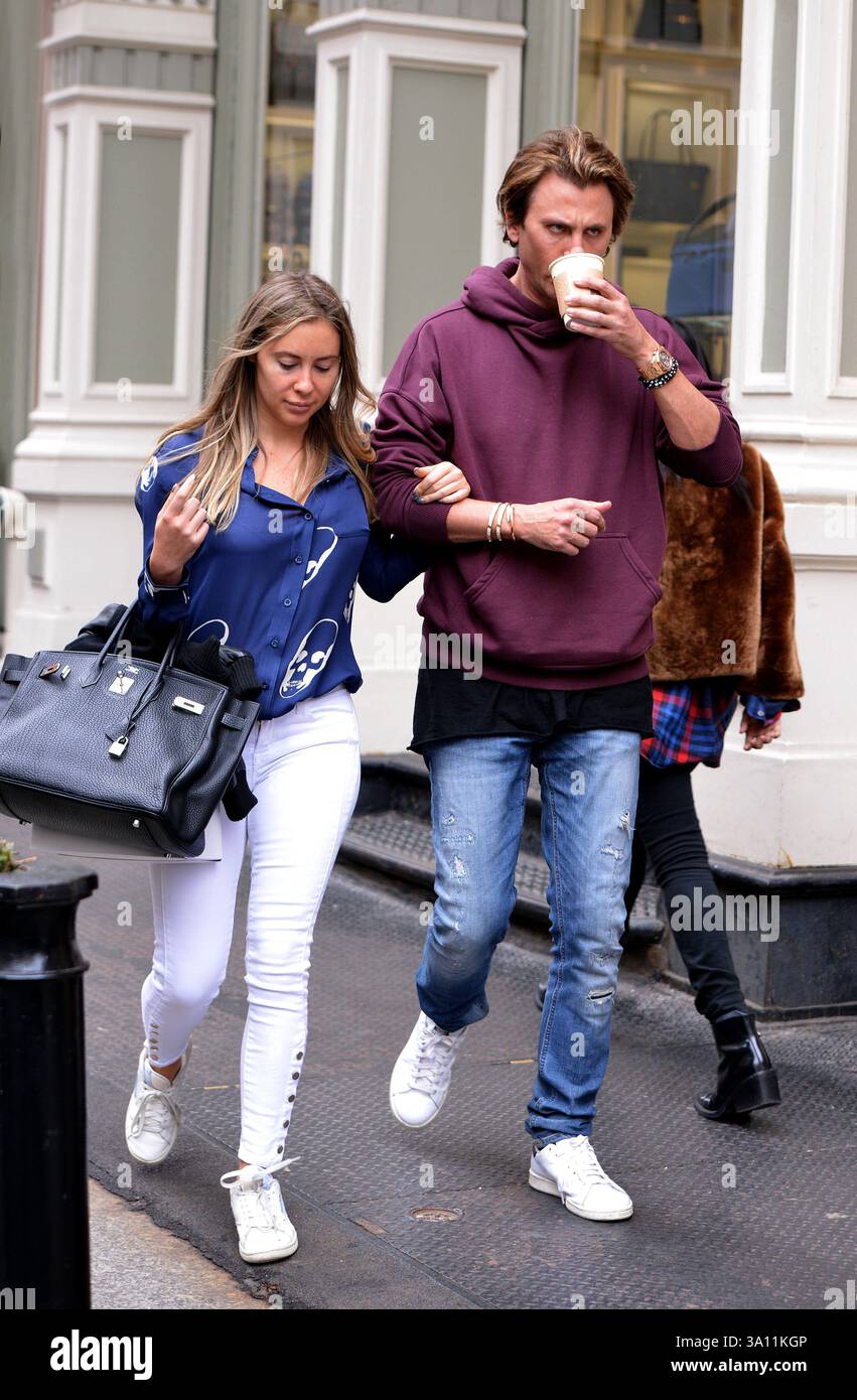TV personality Jonathan Cheban and his girlfriend Anat Popovsky walk in ...