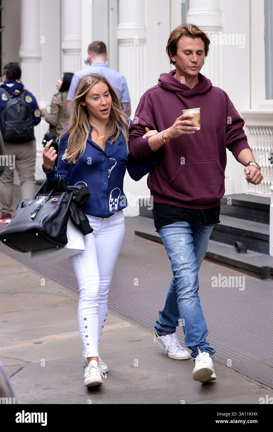 TV personality Jonathan Cheban and his girlfriend Anat Popovsky walk in ...