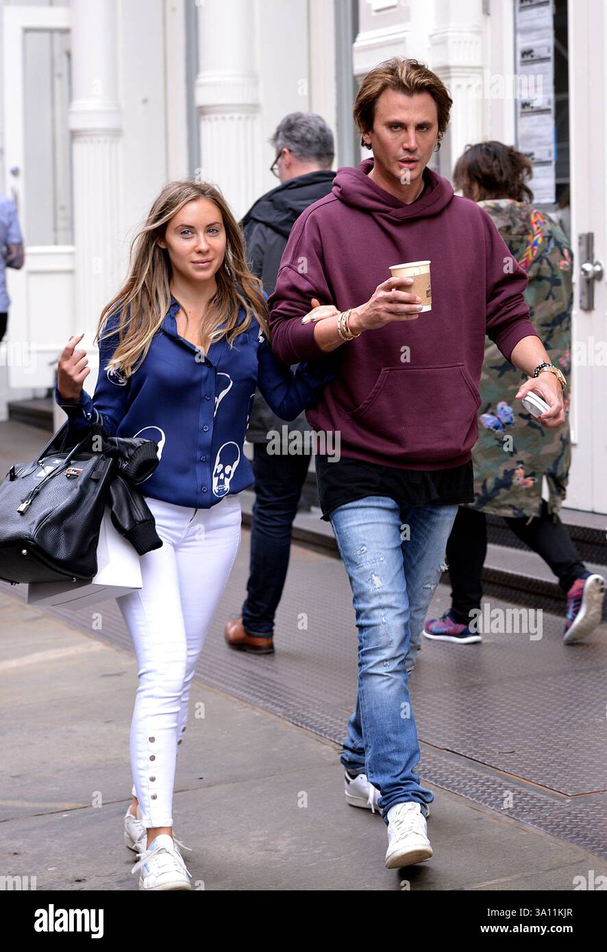 TV personality Jonathan Cheban and his girlfriend Anat Popovsky walk in ...