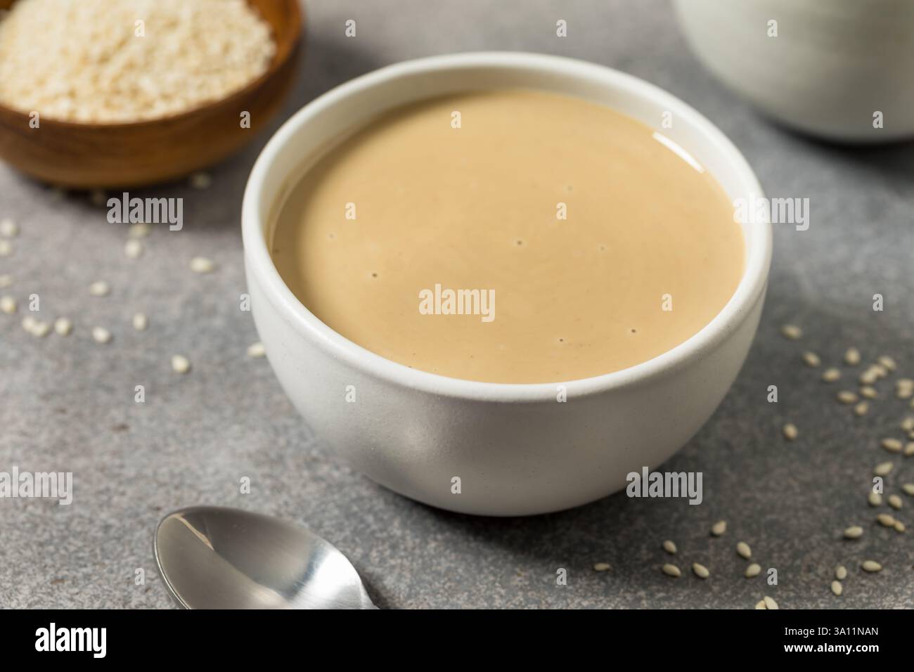 Homemade Organic Tahini Paste Sauce in a Bowl Stock Photo - Alamy