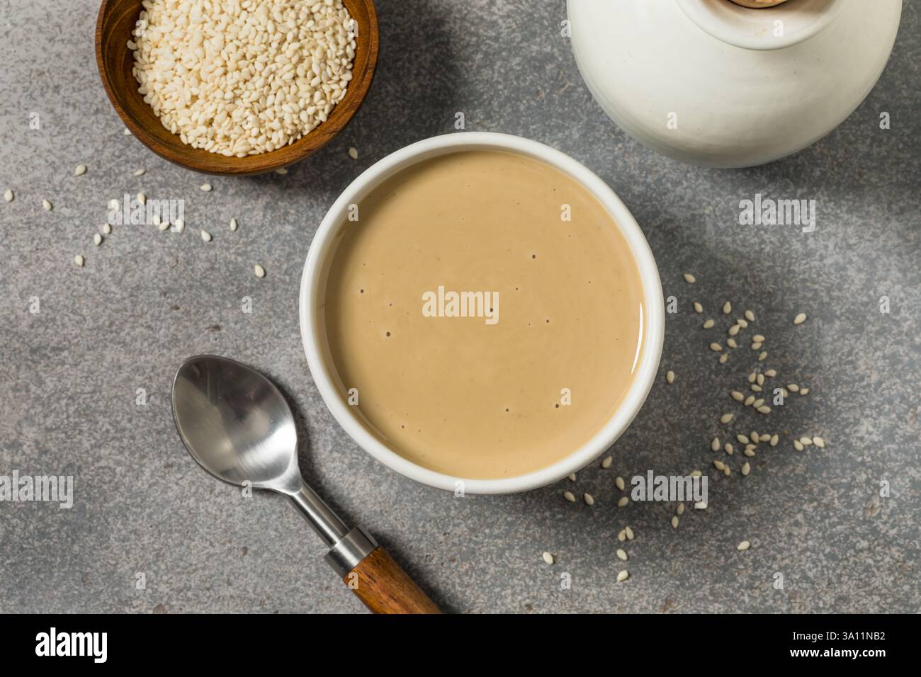 Homemade Organic Tahini Paste Sauce in a Bowl Stock Photo - Alamy