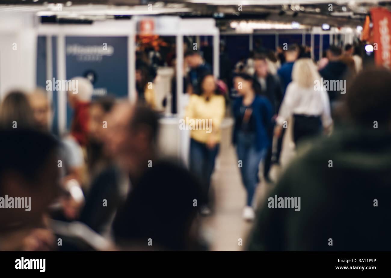 Abstract blurred people at exhibition hall of expo event trade show ...