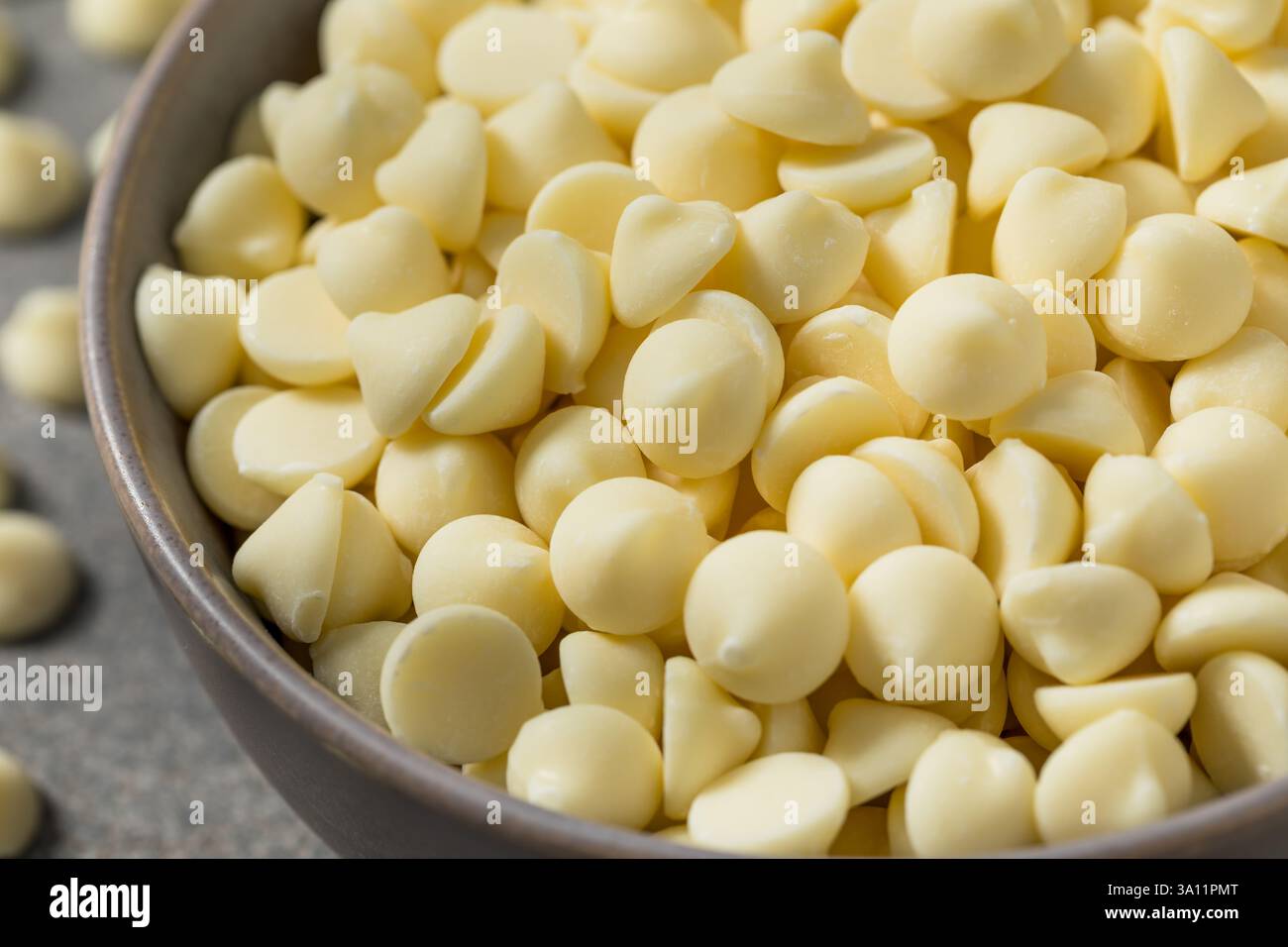 Organic White Chocolate Chips in a Bowl Stock Photo - Alamy
