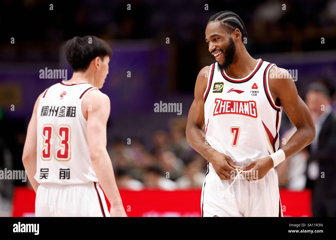Beijing, China. 6th Mar, 2025. Ruben Nembhard (R) of Zhejiang Golden ...
