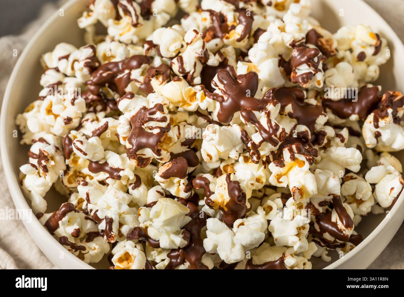 Homemade Chocolate Covered Popcorn with Salt in a Bowl Stock Photo - Alamy