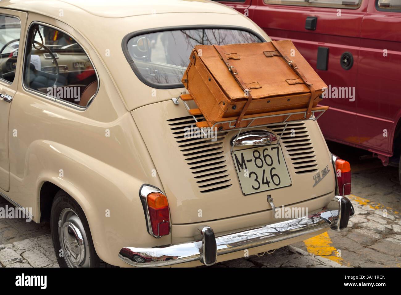 The historic Seat 600, iconic spanish car, in the town of Navacerrada ...
