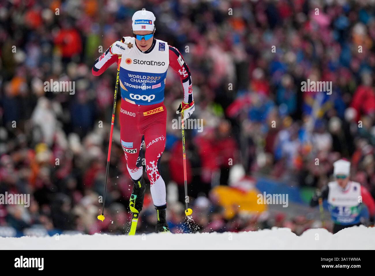 Martin Loewstroem Nyenget, of Norway, competes in the cross-country men ...