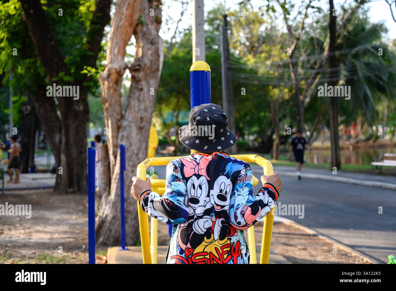 Bangkok, Thailand. March 4th 2025. An elderly lady uses the public ...