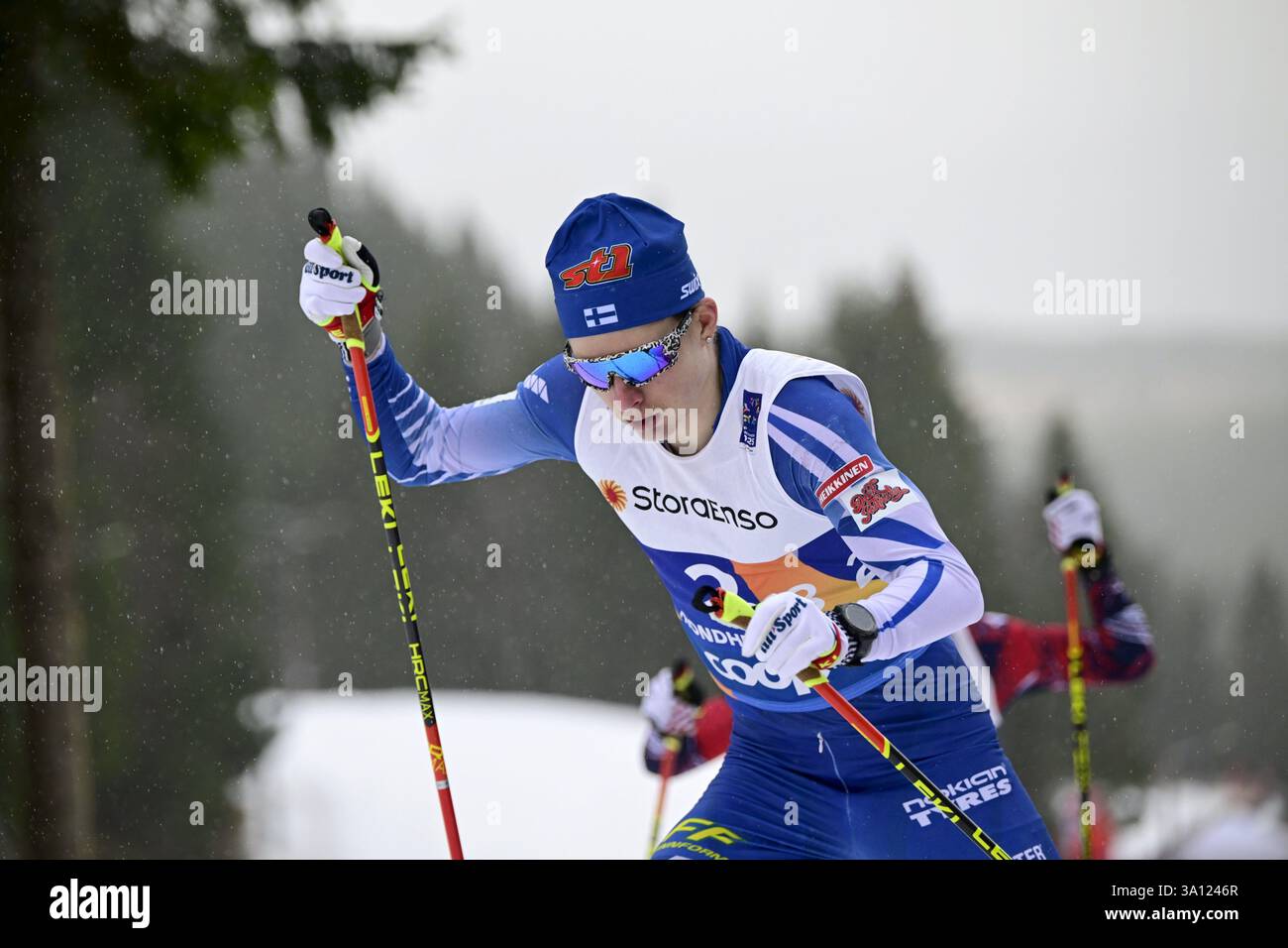 Remi Lindholm of Finland competes during Cross Country Skiing Men's 4x7 ...