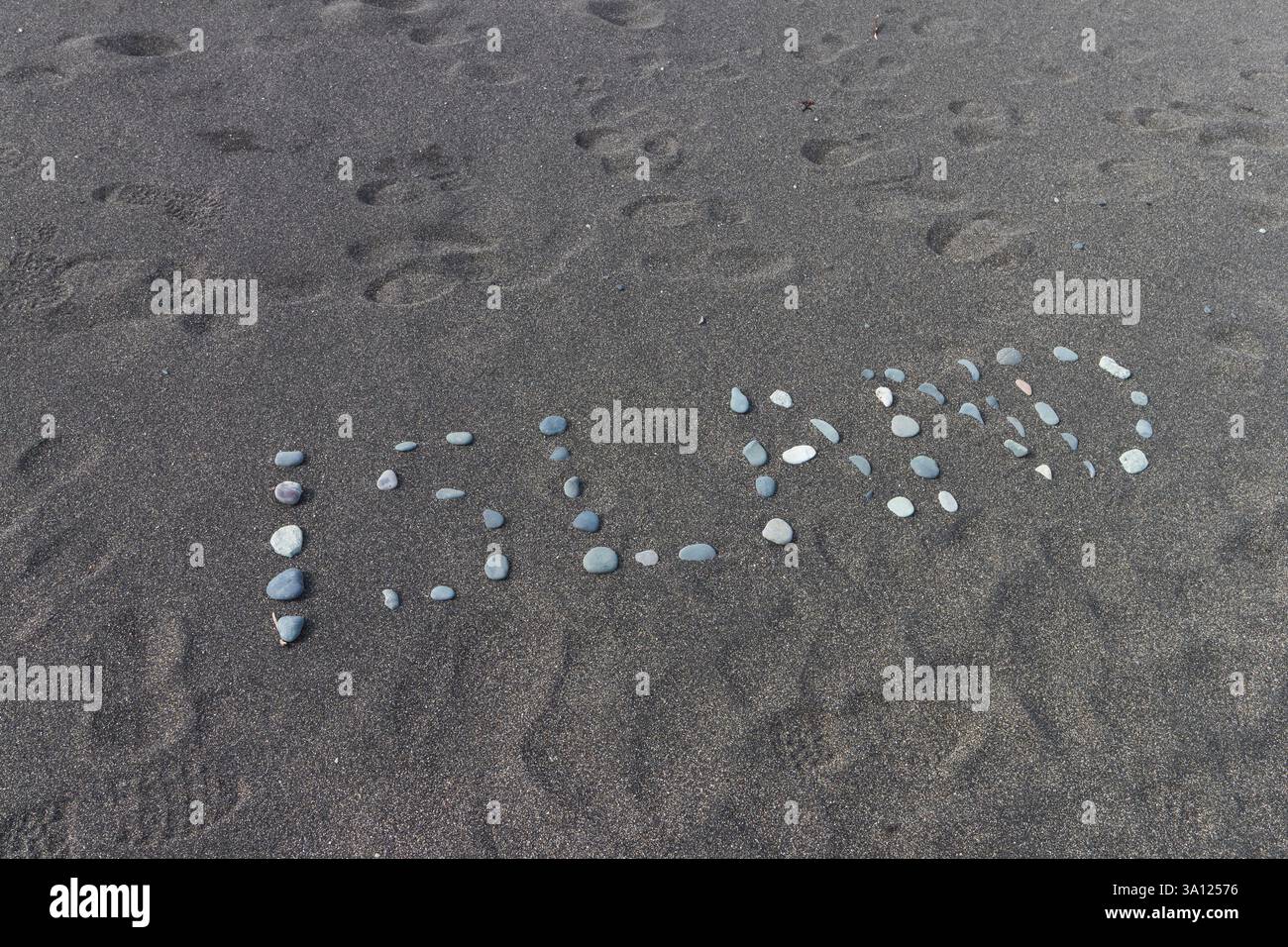 "Island" Written in Sand on the Ground Stock Photo - Alamy