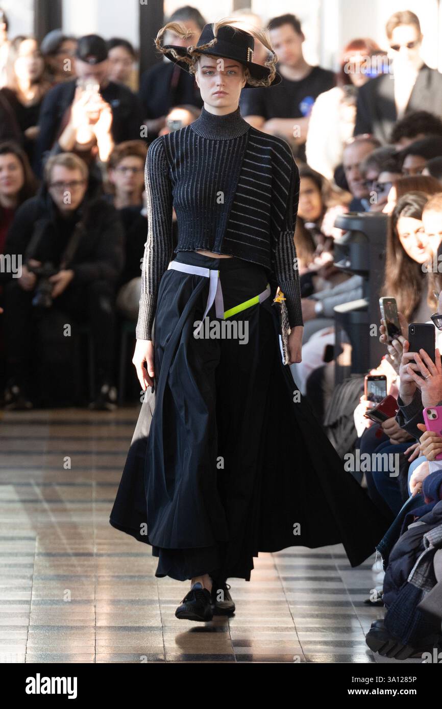Milan, Italy. 2 Mar, 2025. A model walks the runway during the ...