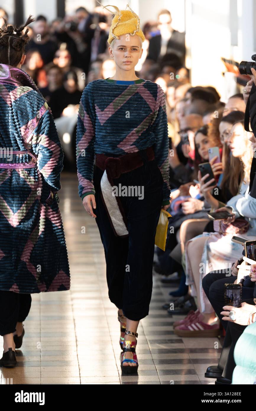 Milan, Italy. 2 Mar, 2025. A model walks the runway during the ...