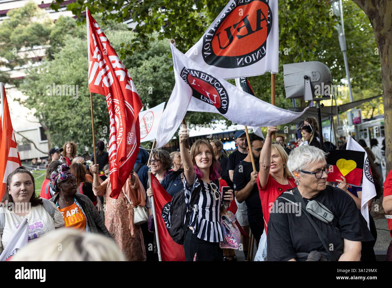 Protesters wave flags and hold placards expressing their views during ...