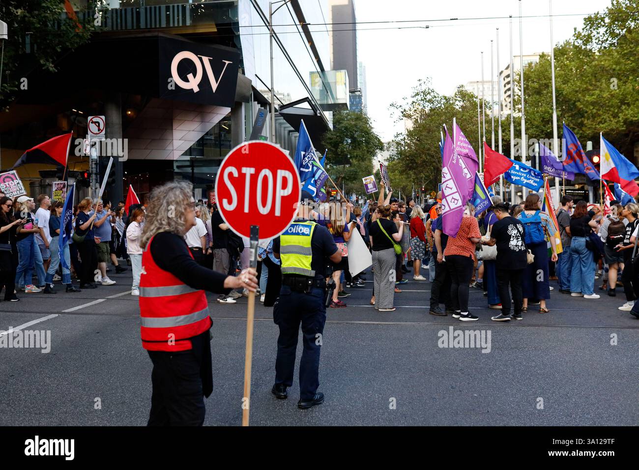 Protesters wave flags while marching through Melbourne's streets during ...