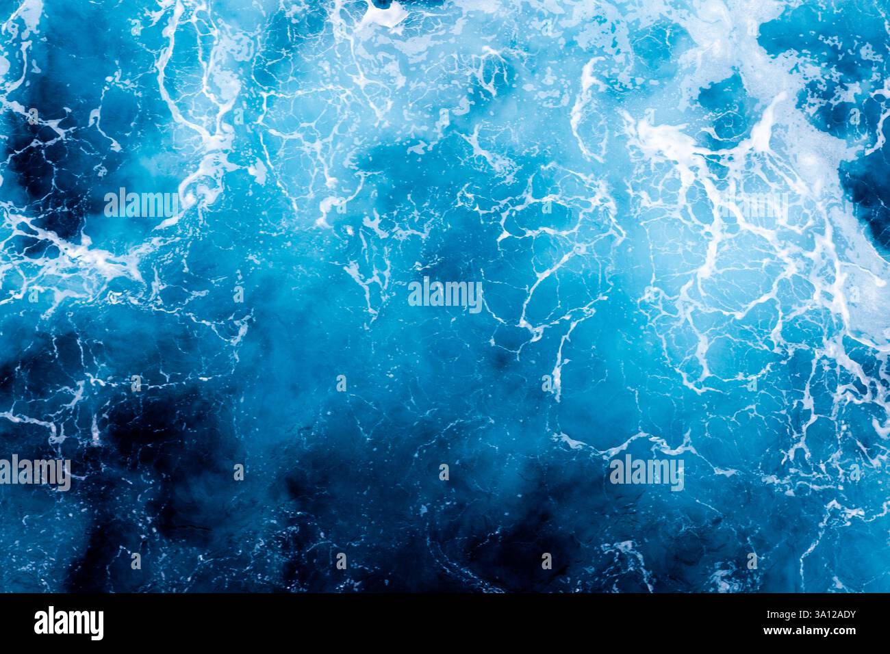 Ocean surface texture. Top view of enchanting water with foam. Can be ...