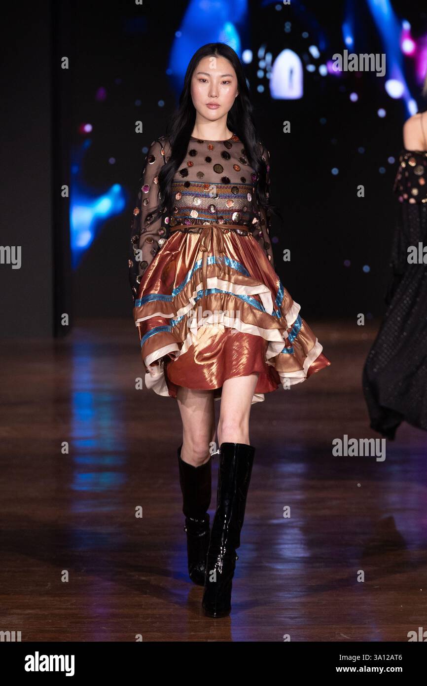 Milan, Italy. 24th Feb, 2025. A model walks the runway during the Custo ...