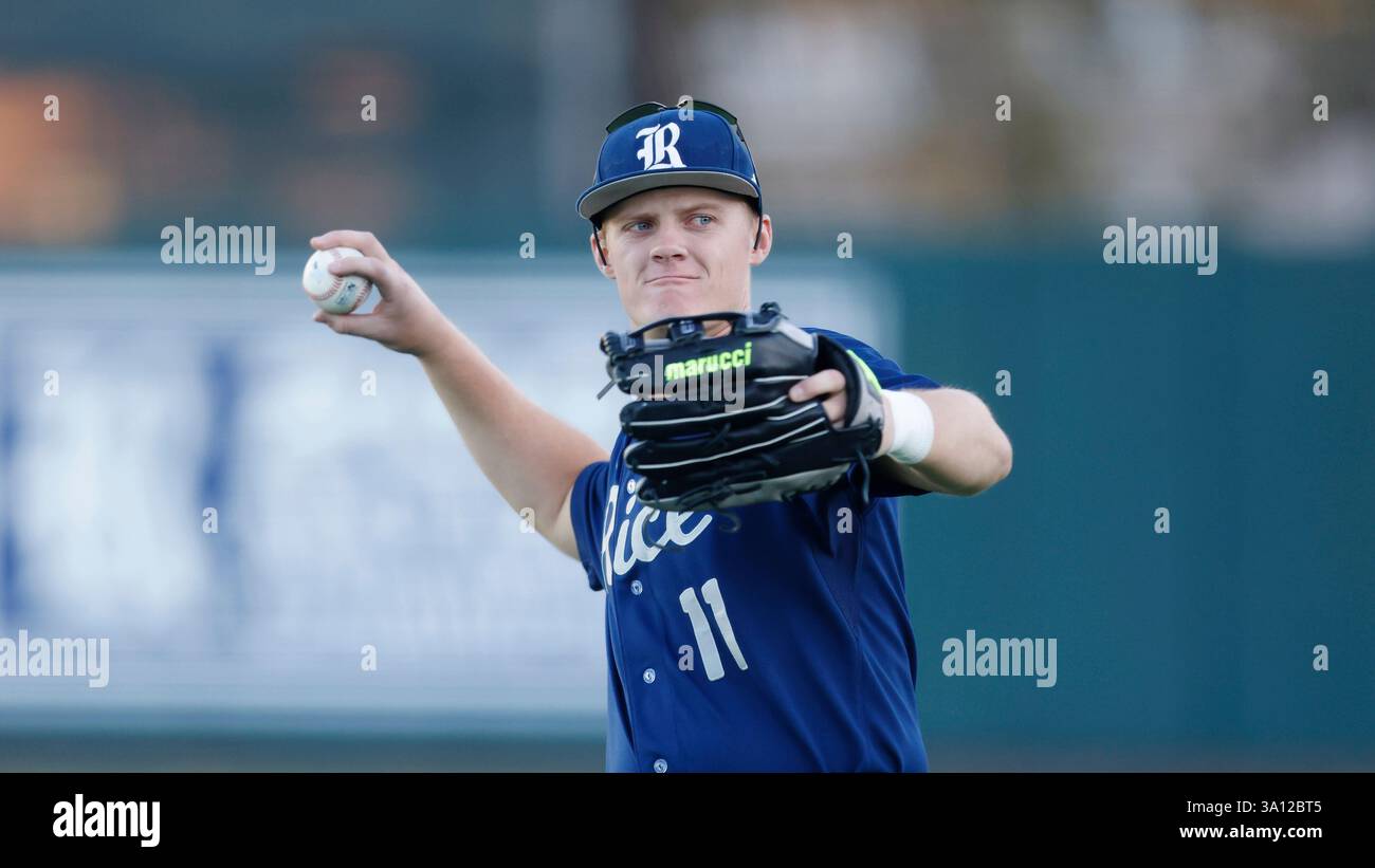 Rice pitcher Austin Eppley (11) warms up before an NCAA baseball game ...