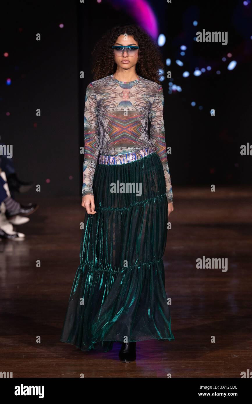 A model walks the runway during the Custo Barcelona Fall/Winter 2025 ...
