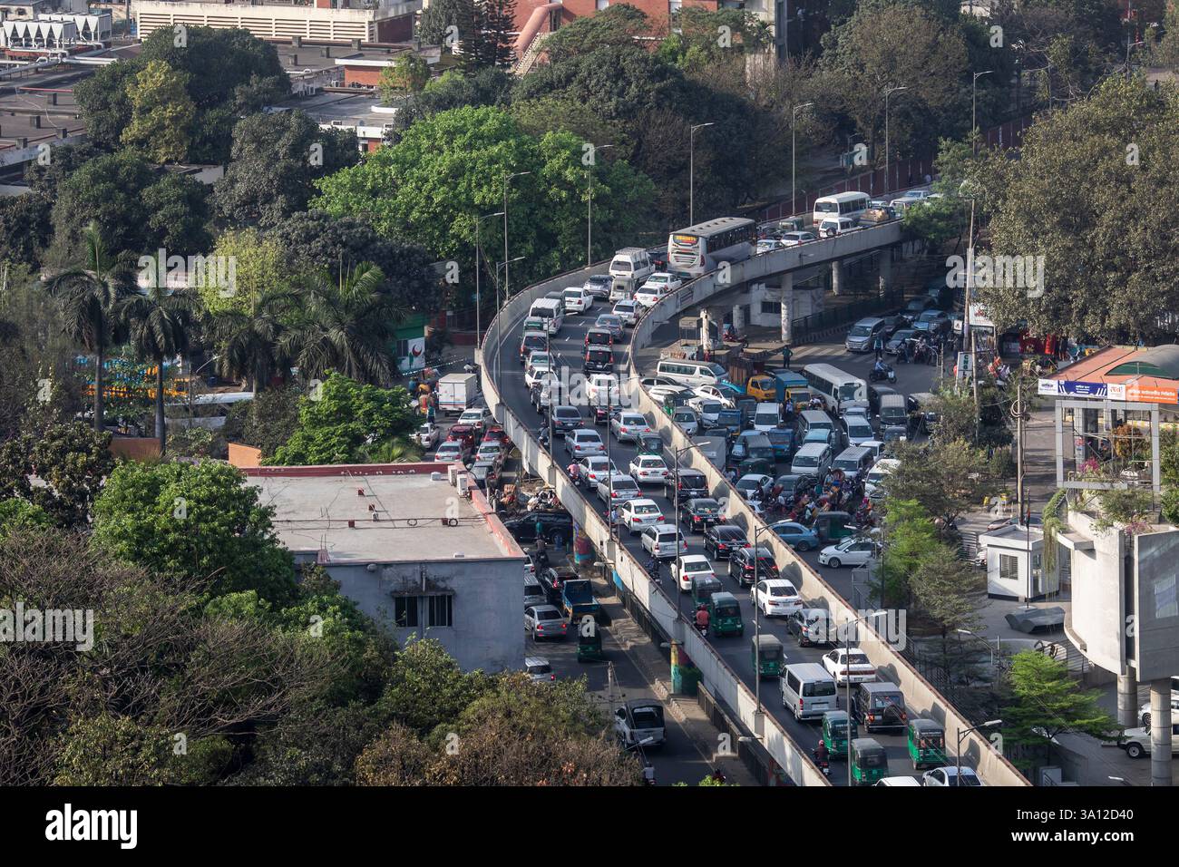 March 5, 2025, Dhaka, Bangladesh: Vehicles move along a road in Dhaka ...