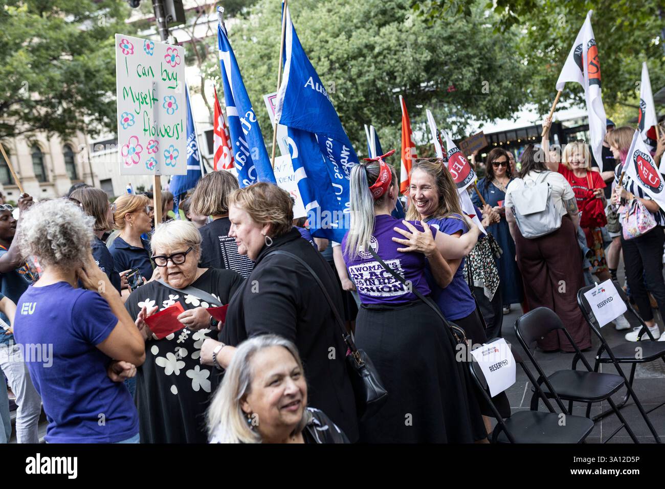 Protesters wave flags and hold placards expressing their views during ...