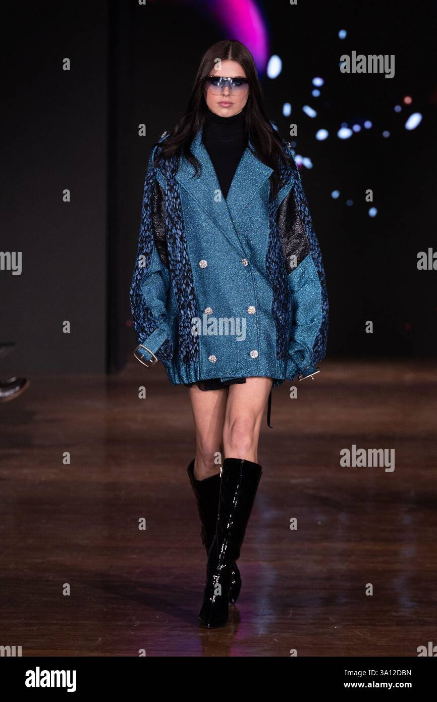 A model walks the runway during the Custo Barcelona Fall/Winter 2025 ...