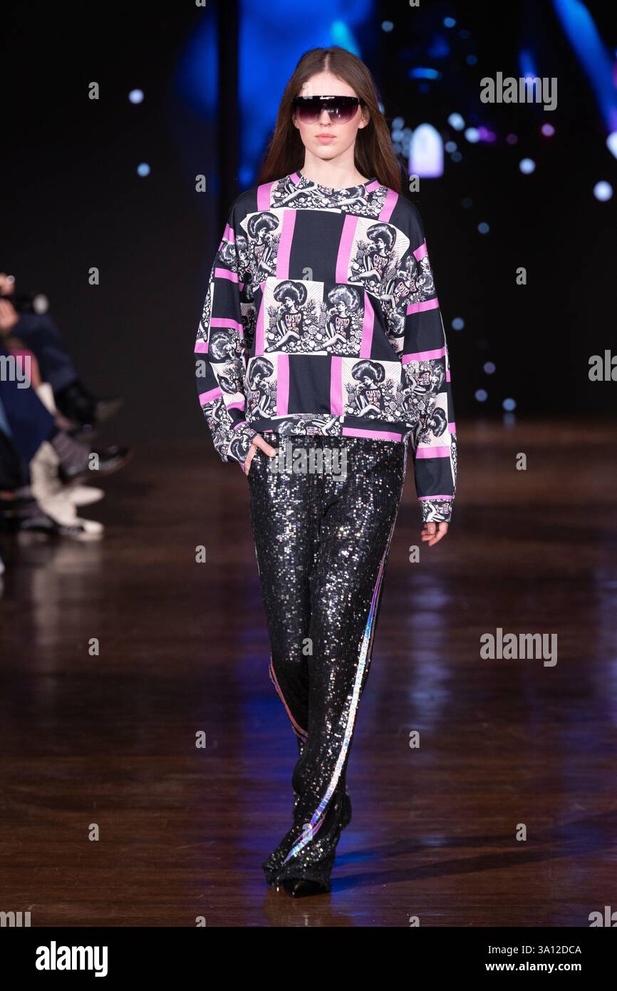 A model walks the runway during the Custo Barcelona Fall/Winter 2025 ...