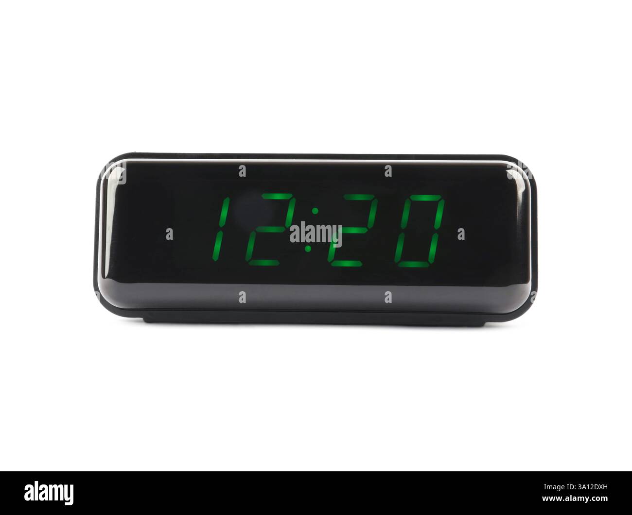Digital alarm clock showing 12:20 o'clock on white background Stock ...