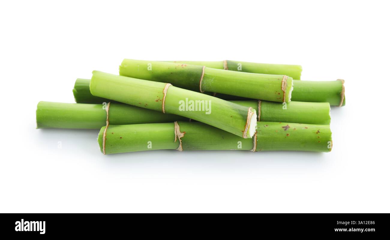Cut green bamboo stems isolated on white Stock Photo - Alamy