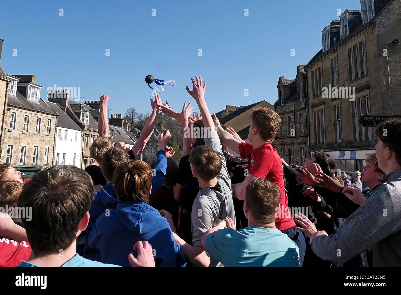 Jethart Hand Ba' Youths chase after the leather ball during the annual ...