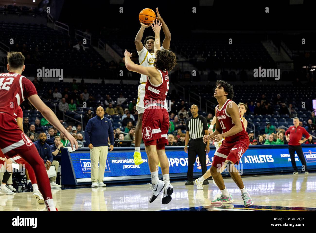 March 05, 2025: Notre Dame guard Markus Burton (3) shoots over Stanford ...