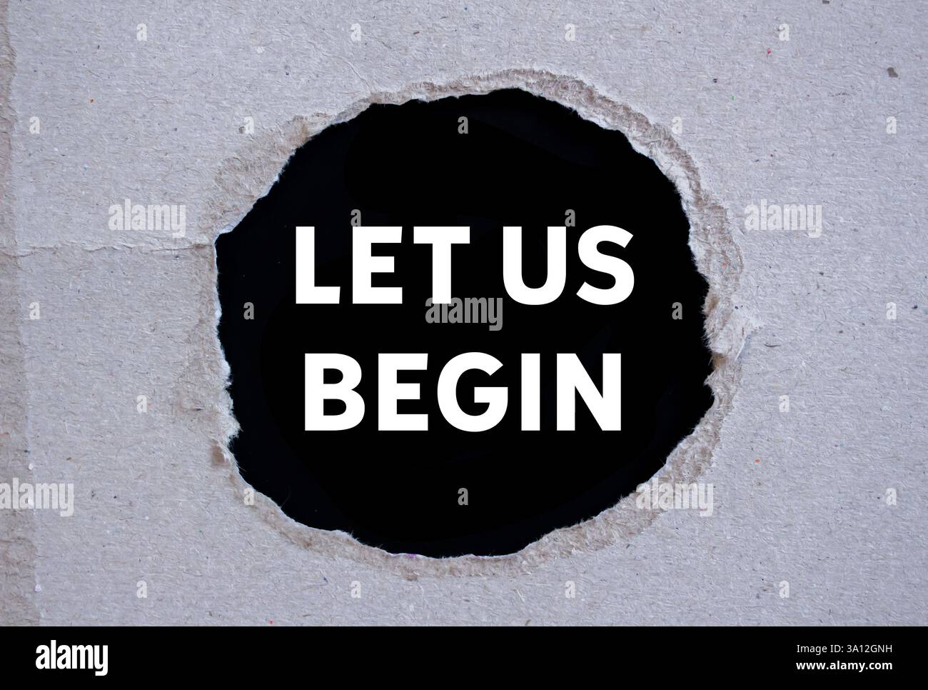 Let us begin message written on ripped torn paper on black background ...