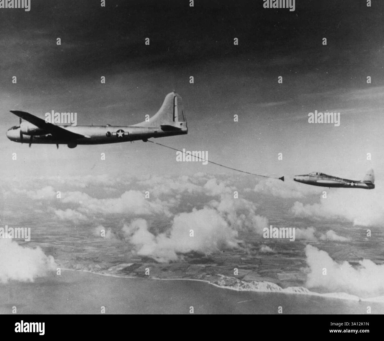 How Jets Refuel on Atlantic Flight -- A B-29 tanker plane with a fuel ...