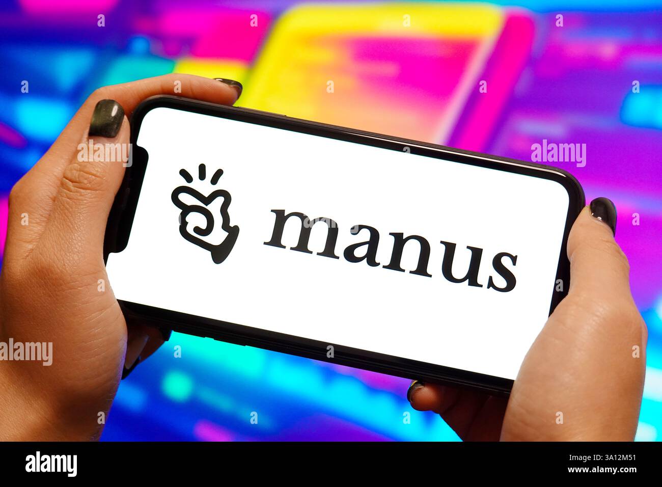 In this photo illustration, a Manus logo is displayed on the screen of ...