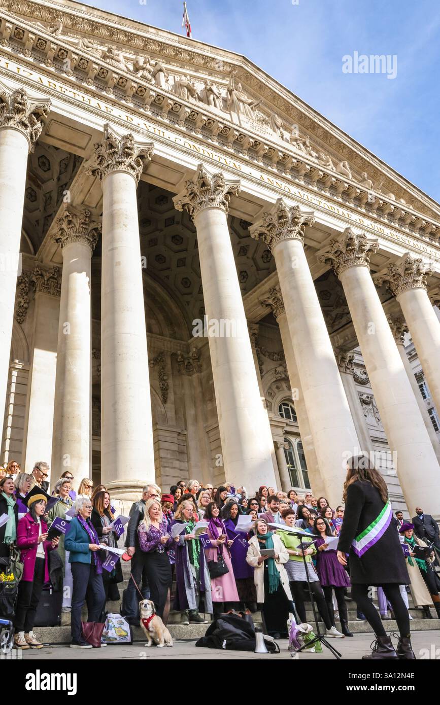 London, UK. 06 March 2025. The choir on the steps of the Royal Exchange ...