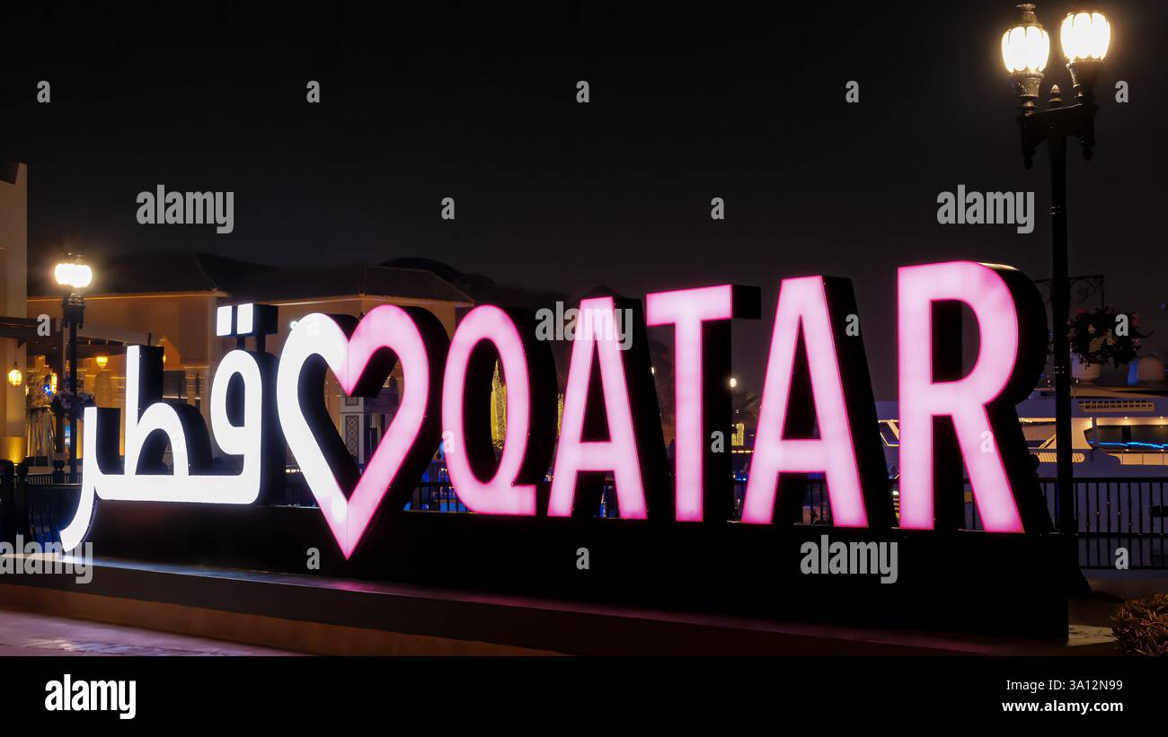 Iconic I Love Qatar Sign, a symbol in Doha, glowing in pink neon light ...