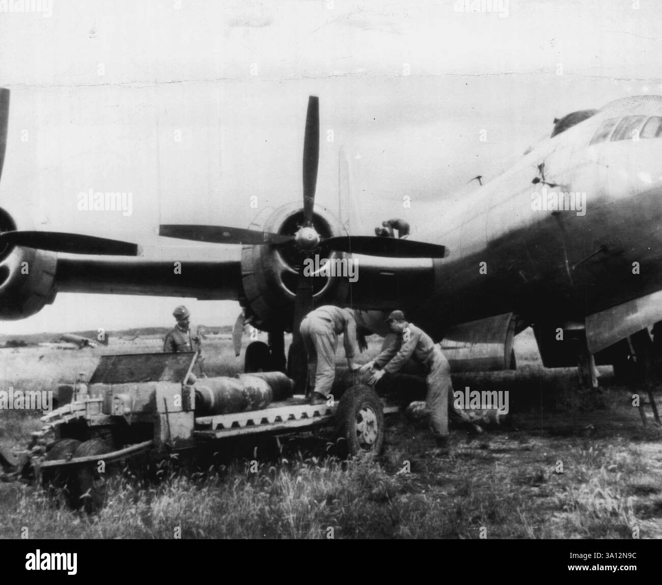 Bombs ***** 20th Bomber Command load bombs into the ***** Superfortress ...